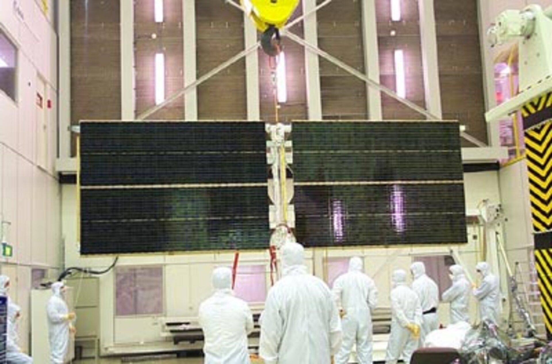 ESA - Technicians lift Hubble's new solar arrays ESA - Technicians lift Hubble's new solar arrays